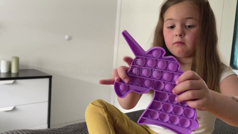 Girl Play Pop it Bubble Popping Game Stock Video - Video of challenge ...