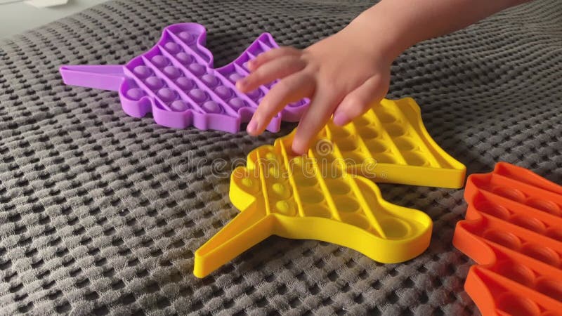 Girl Play Pop it Bubble Popping Game Stock Footage - Video of battle ...