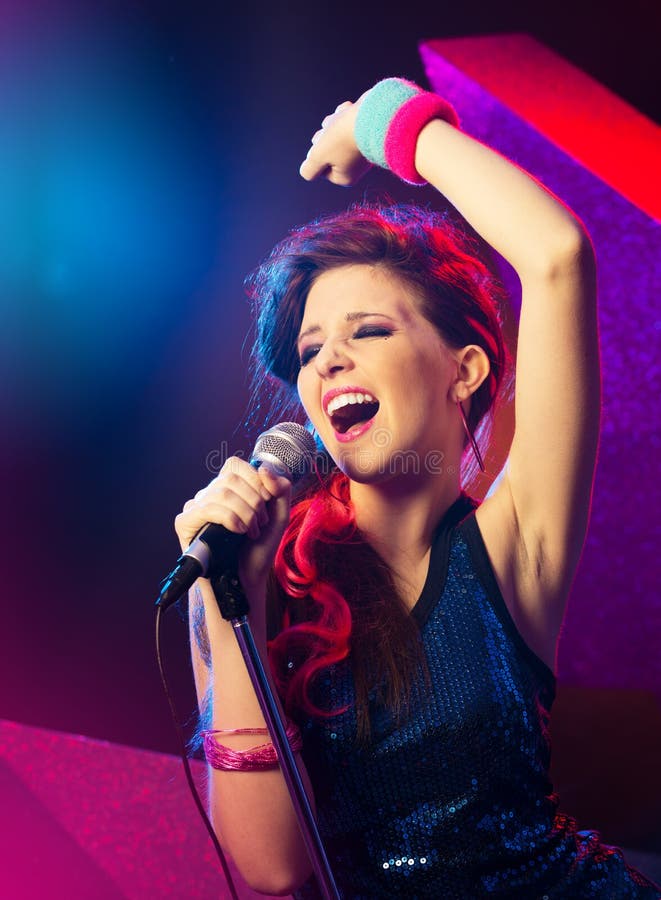 Pop star with hand raised stock photo. Image of singer - 44573526