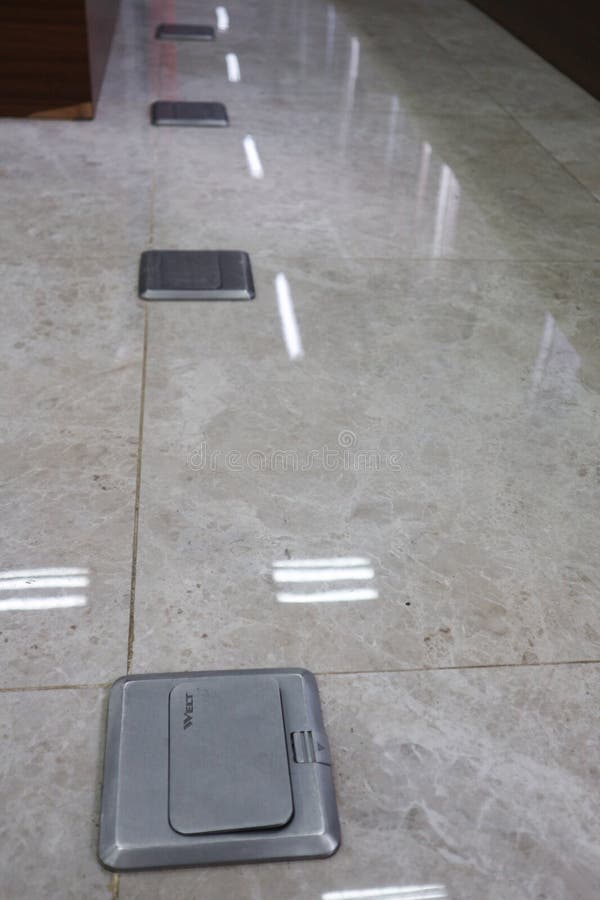 Pop Up Floor Socket for Outlet Data Socket on Tile Floor Stock Photo ...