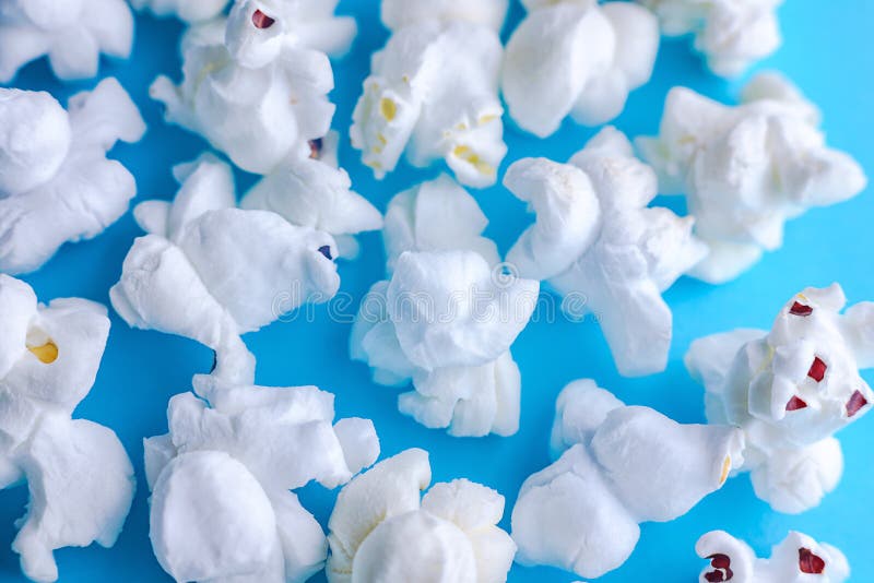 Popcorn on a Blue Background. Macro Image of Popcorn Stock Image ...