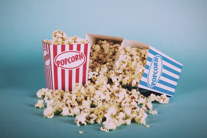 Popcorn Bucket Against a Blue Background Vintage Retro Filter. Stock ...