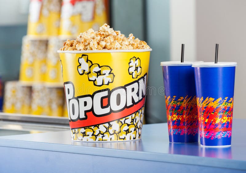 Popcorn Bucket with Drinks on Concession Counter Stock Photo - Image of ...