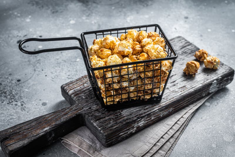 Popcorn with Caramel in Basket. Gray Background Stock Photo - Image of ...
