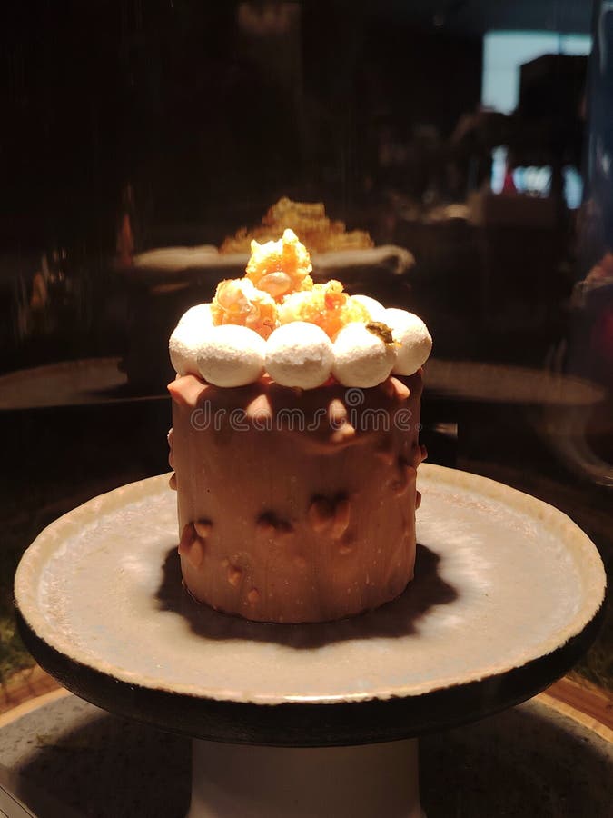 Popcorn chocolate cake stock image. Image of dessert - 350189453