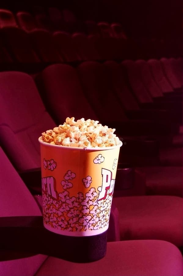 Popcorn in a cinema stock image. Image of popcorn, leisure - 13200631