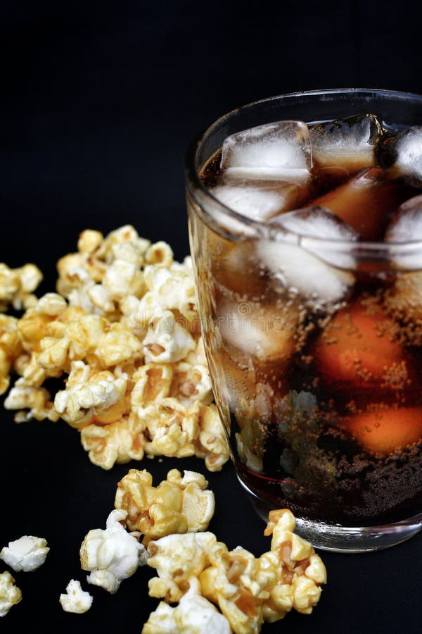 Popcorn and cola stock photo. Image of golden, kernel - 34561892