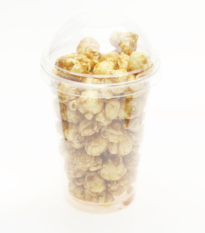Popcorn in a plastic cup stock photo. Image of crunchy - 131470972