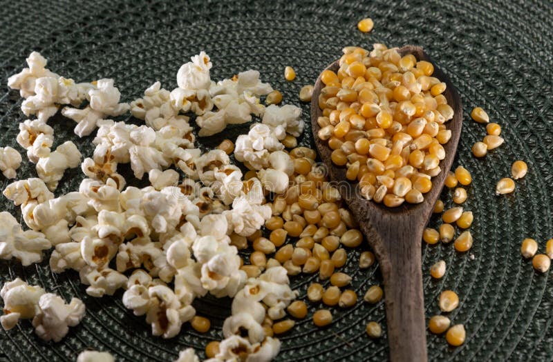 Popcorn Corn Grains on a Kitchen Table and Household Items Stock Photo ...