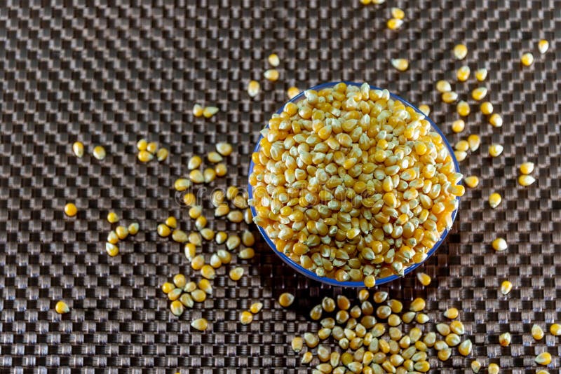 Popcorn Corn Grains on a Kitchen Table and Household Items Stock Image ...