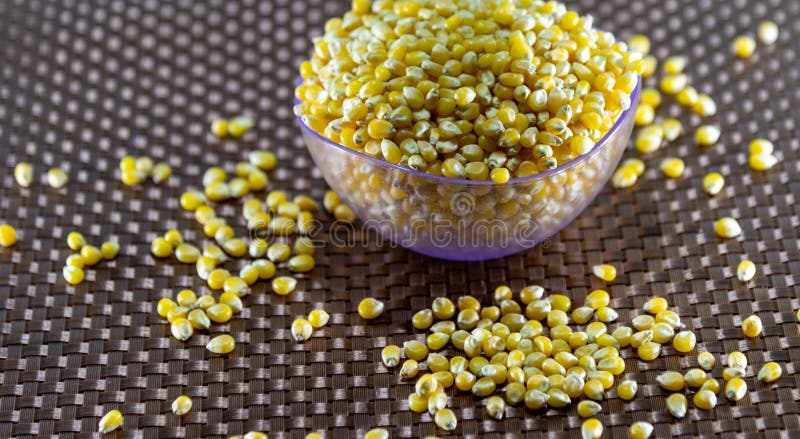 Popcorn Corn Grains on a Kitchen Table and Household Items Stock Photo ...
