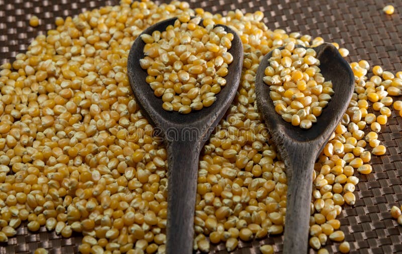 Popcorn Corn Grains on a Kitchen Table and Household Items Stock Image ...