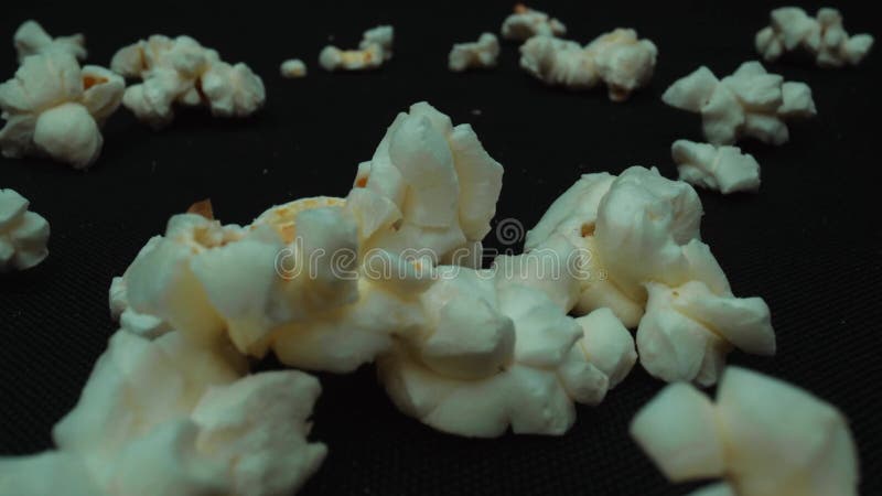 Popcorn Falling at Floor with Popcorn Scattering Around at Background ...