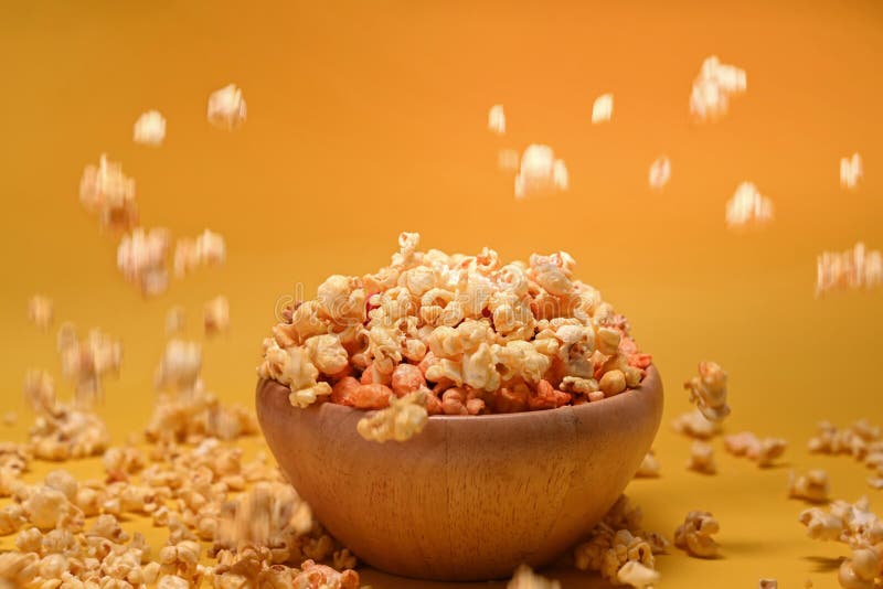 Popcorn Falling or Pouring in To Wooden Bowl. Stock Image - Image of ...