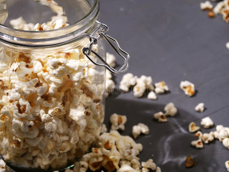 Popcorn in a Glass Jar Medium Shot Stock Image - Image of isolated ...