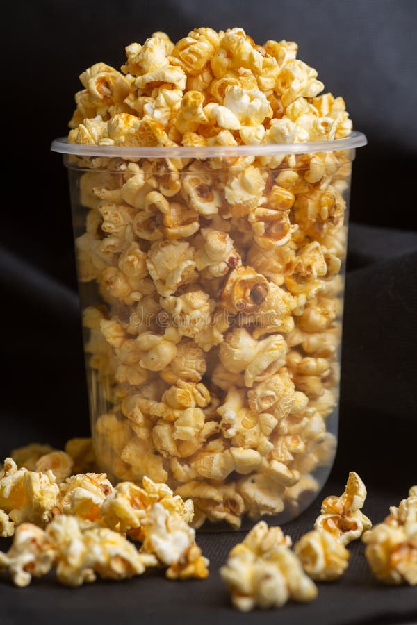 Popcorn in a large bucket stock image. Image of isolated - 177926509