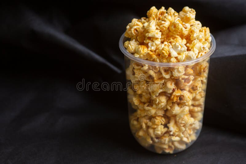 Popcorn in a large bucket stock photo. Image of crunchy - 177926600