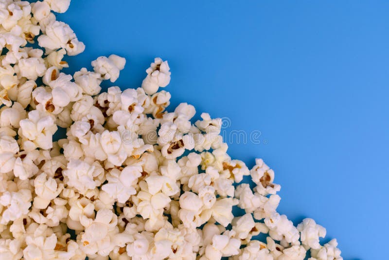 Popcorn on a Light Blue Background.Copy Space. Stock Image - Image of ...