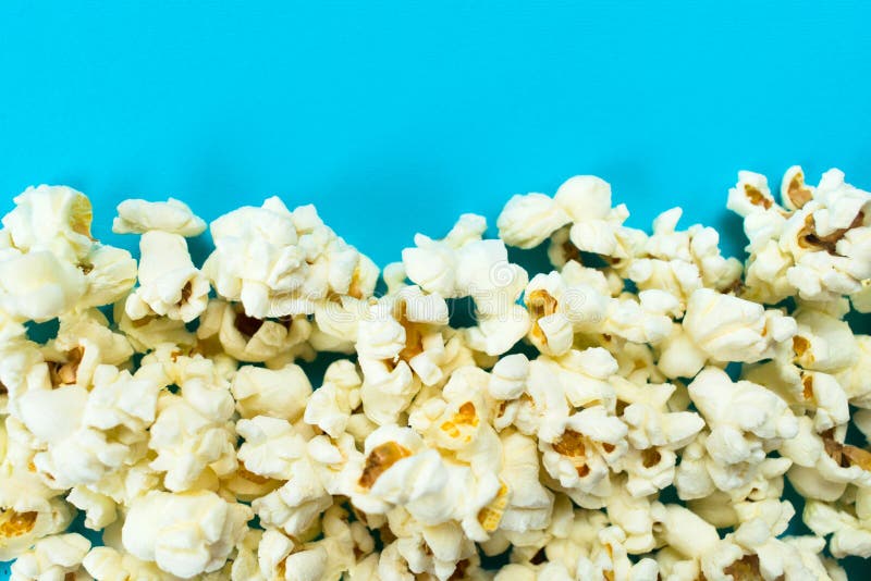 Popcorn on a Light Blue Background.Copy Space. Stock Image - Image of ...