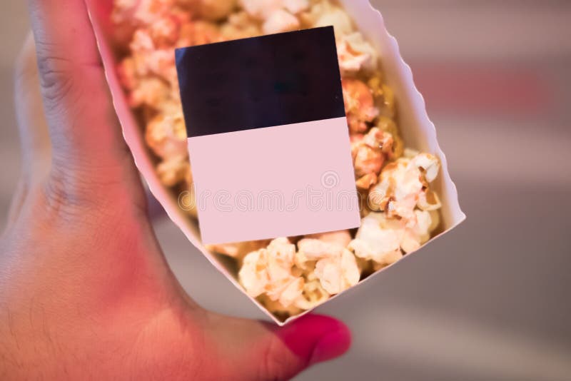 Popcorn and movie tickets stock photo. Image of hold - 162745388