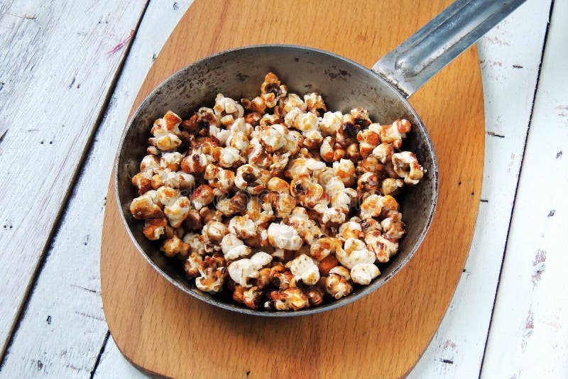 Popcorn in a pan stock photo. Image of fresh, fluffy - 79802332