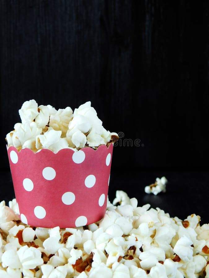 Popcorn in a paper cup stock image. Image of crunch, popcorn - 92113413