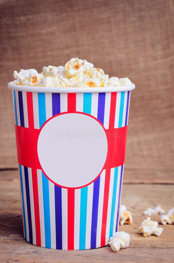 Popcorn in Paper Cup on Wooden Surface. Copy Space Stock Image - Image ...