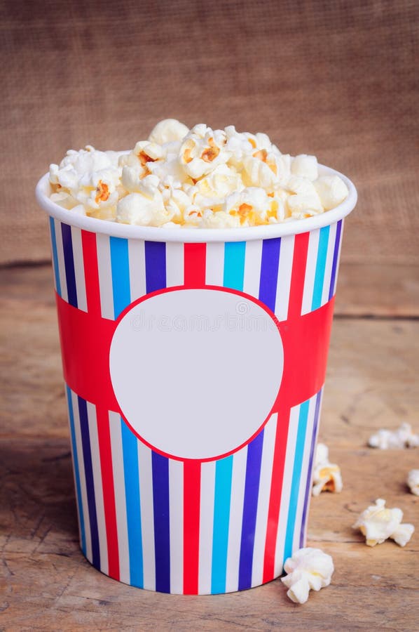 Popcorn in Paper Cup on Wooden Surface. Copy Space Stock Photo - Image ...