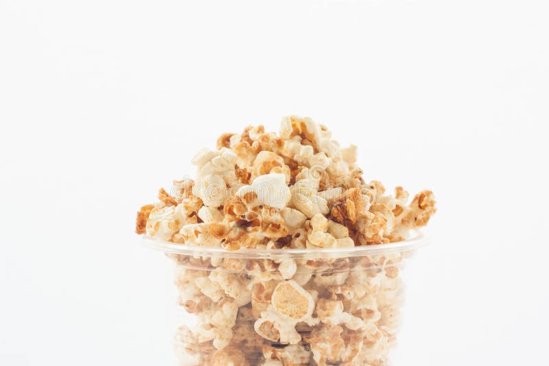 Popcorn in a plastic cup stock photo. Image of crunchy - 131470972