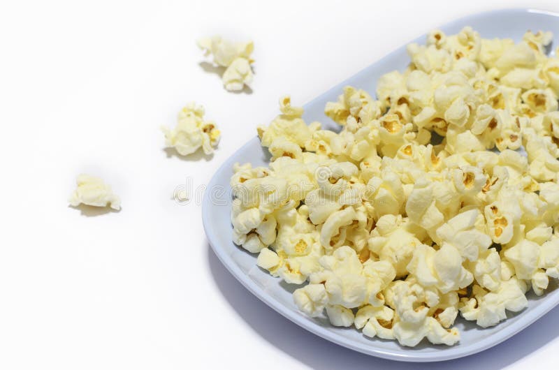 Popcorn at the plate stock image. Image of buttered, appetizing - 46846167