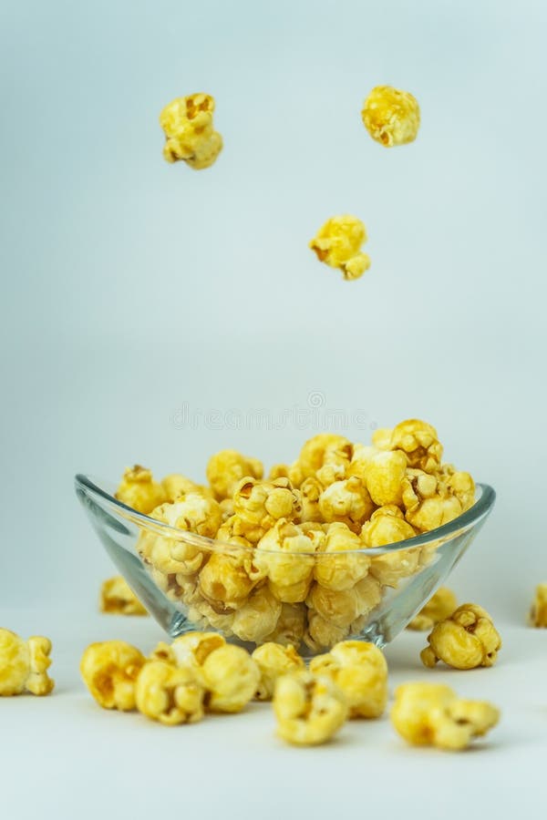Popcorn in a Plate on a White Background. Stock Image - Image of ...