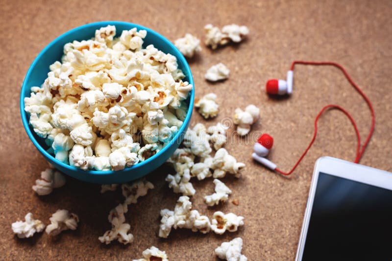 Popcorn with a smartphone stock image. Image of popcorn - 106844901