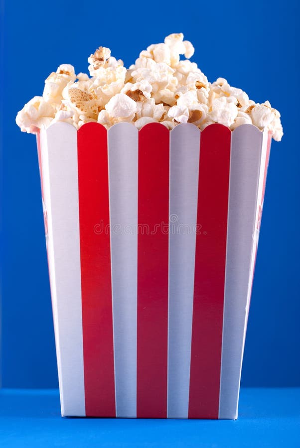 Popcorn in Striped Box on a Blue Background Stock Image - Image of film ...