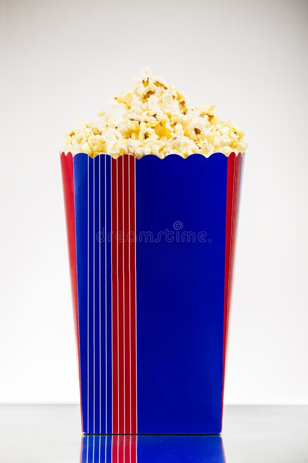 Popcorn in Striped Bucket on White Background Stock Image - Image of ...