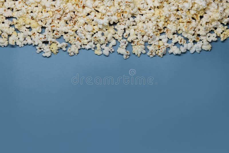 Popcorn Texture on a Blue Background Stock Photo - Image of movie ...
