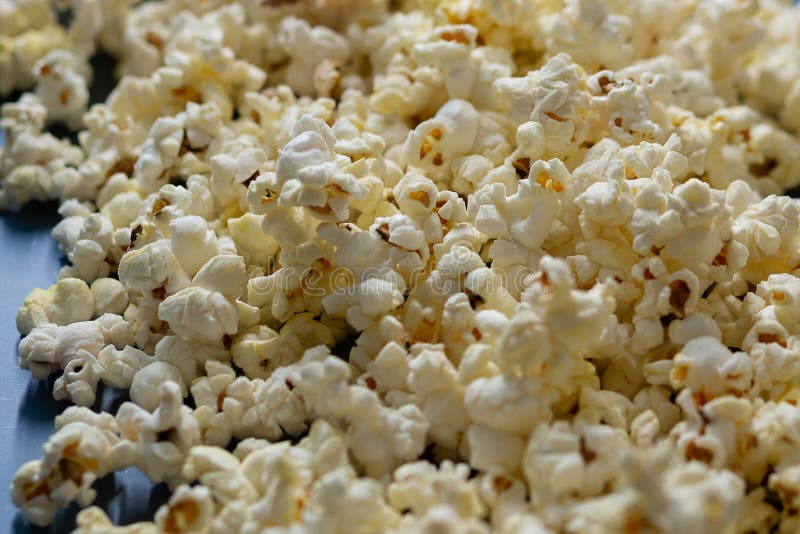 Popcorn Texture on a Blue Background Stock Image - Image of small ...