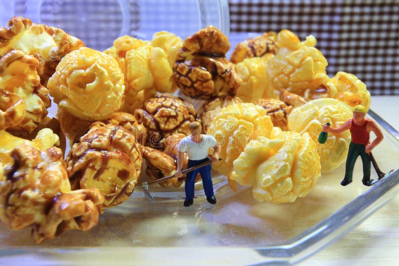 Popcorn workers stock photo. Image of delicious, worker - 66381572