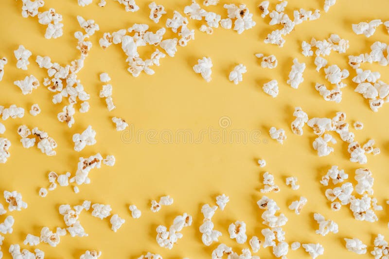 Popcorn on a Yellow Background As a Background Image. Top View Stock ...