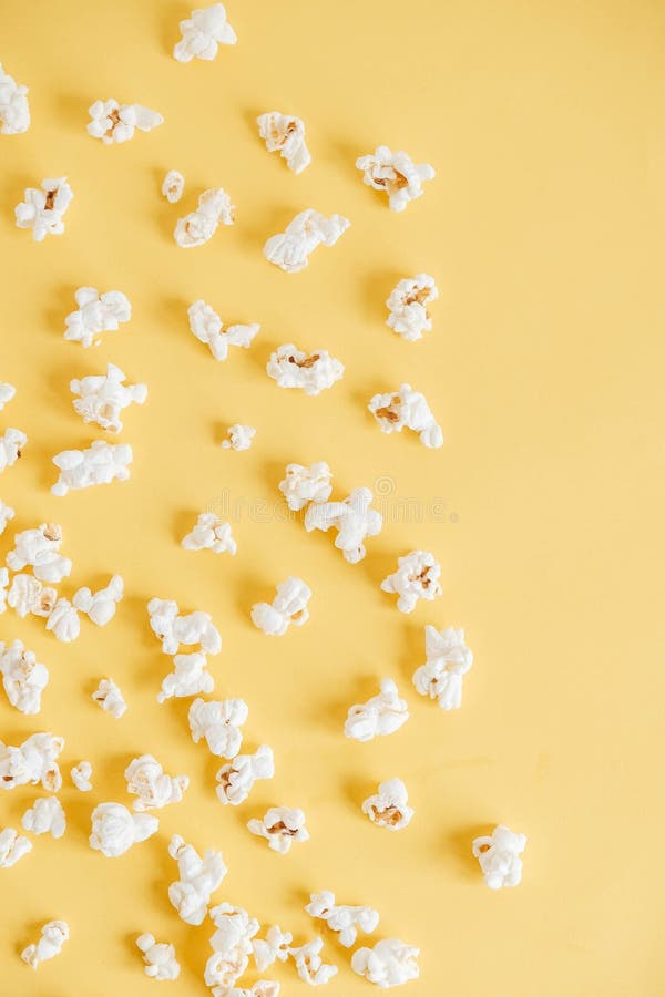 Popcorn on a Yellow Background As a Background Image. Top View Stock ...