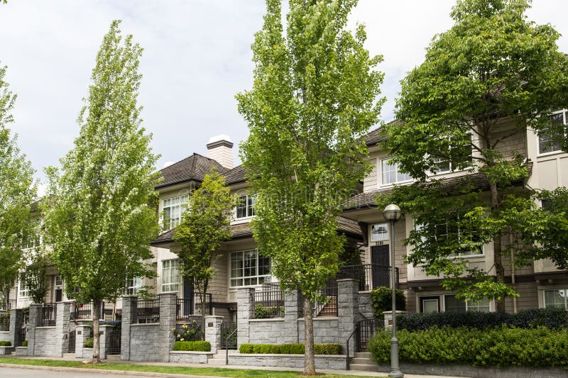 New Row Houses stock photo. Image of suburbs, retirement - 67892416