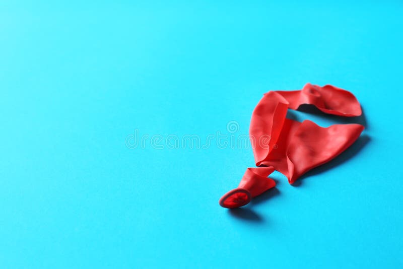 Popped blue latex balloon stock image. Image of decoration - 139203879