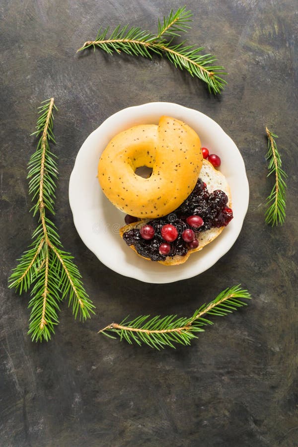 Poppy Bagels with Jam and Cranberries Stock Photo - Image of dish ...