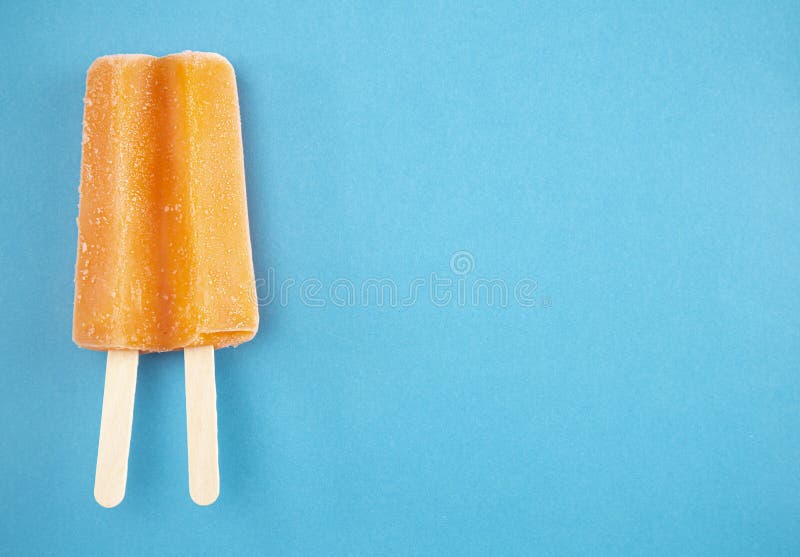 Popsicle on a Blue Background Stock Image - Image of summer, stuck ...