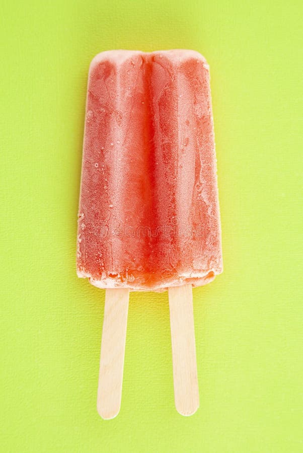 Popsicle on a Bright Green Background Stock Photo - Image of stick ...