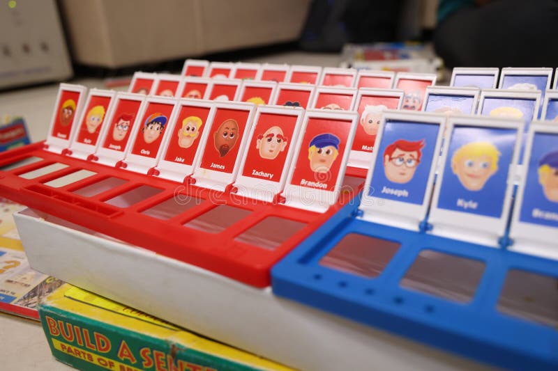 Guess who board game editorial image. Image of family - 306866795