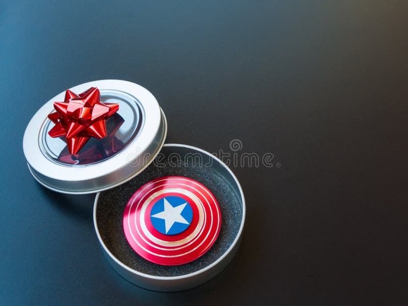 Popular Colourful Fidget Spinner Toy in a Gift Box on a Black ...