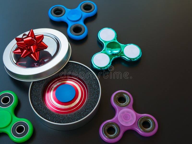 Popular Colourful Fidget Spinner Toy in a Gift Box on a Black ...