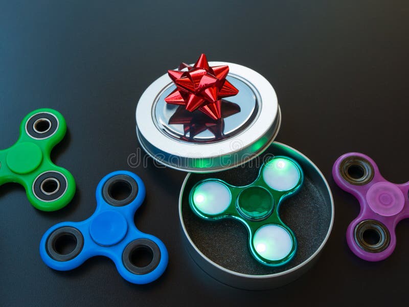 Popular Colourful Fidget Spinner Toy in a Gift Box on a Black ...