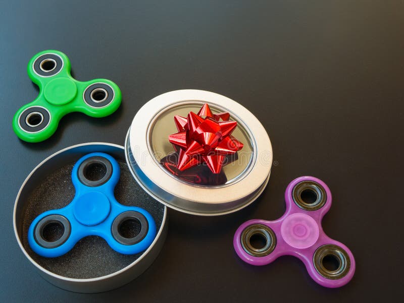 Popular Colourful Fidget Spinner Toy in a Gift Box on a Black ...