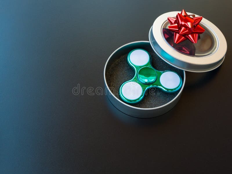 Popular Colourful Fidget Spinner Toy in a Gift Box on a Black ...